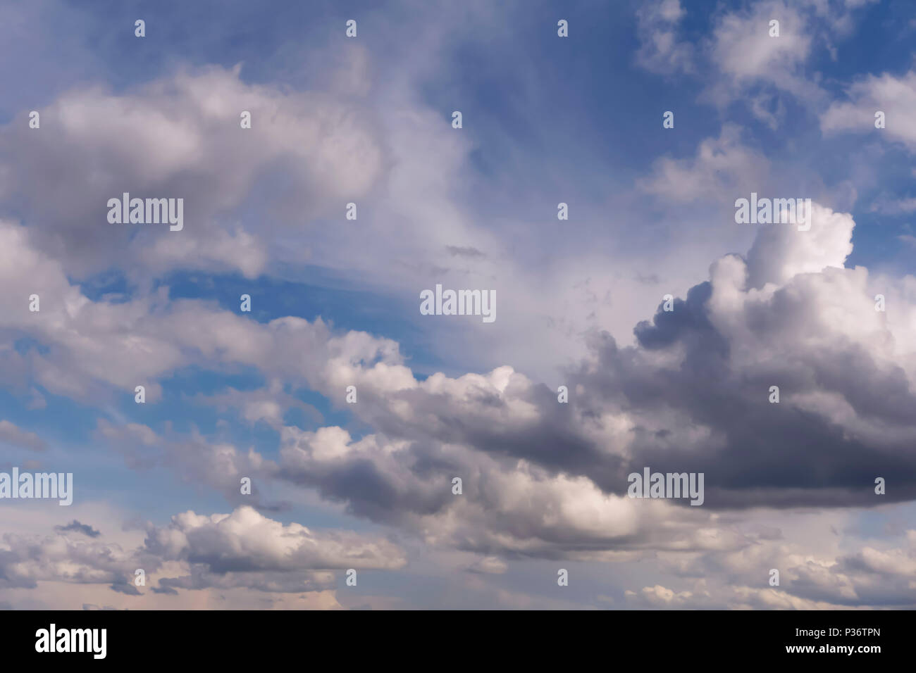 background - blue sky with rain cumulus clouds Stock Photo - Alamy