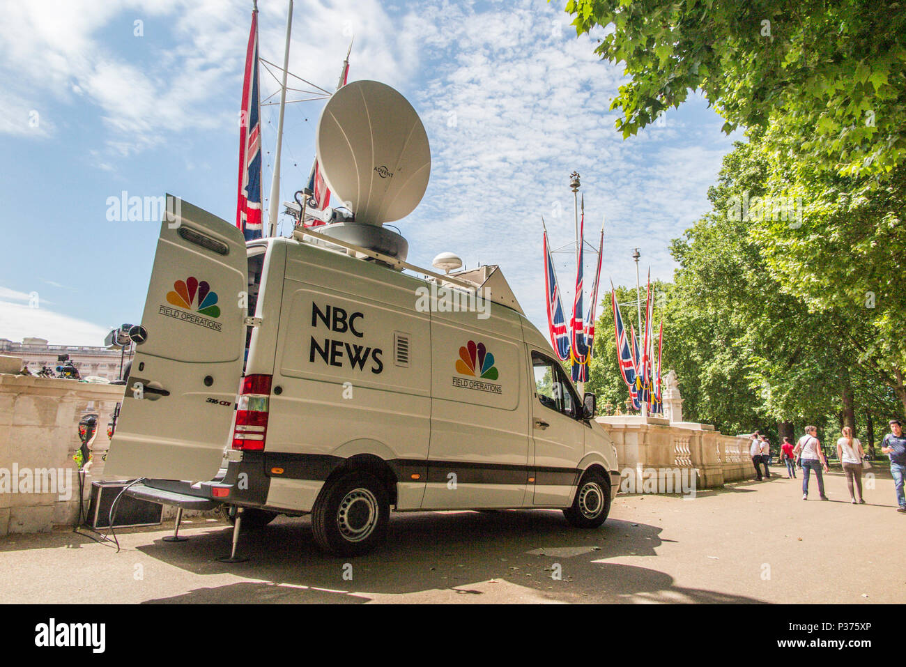 An NBC news van outside Buckingham Palace, submitting a news broadcast ...