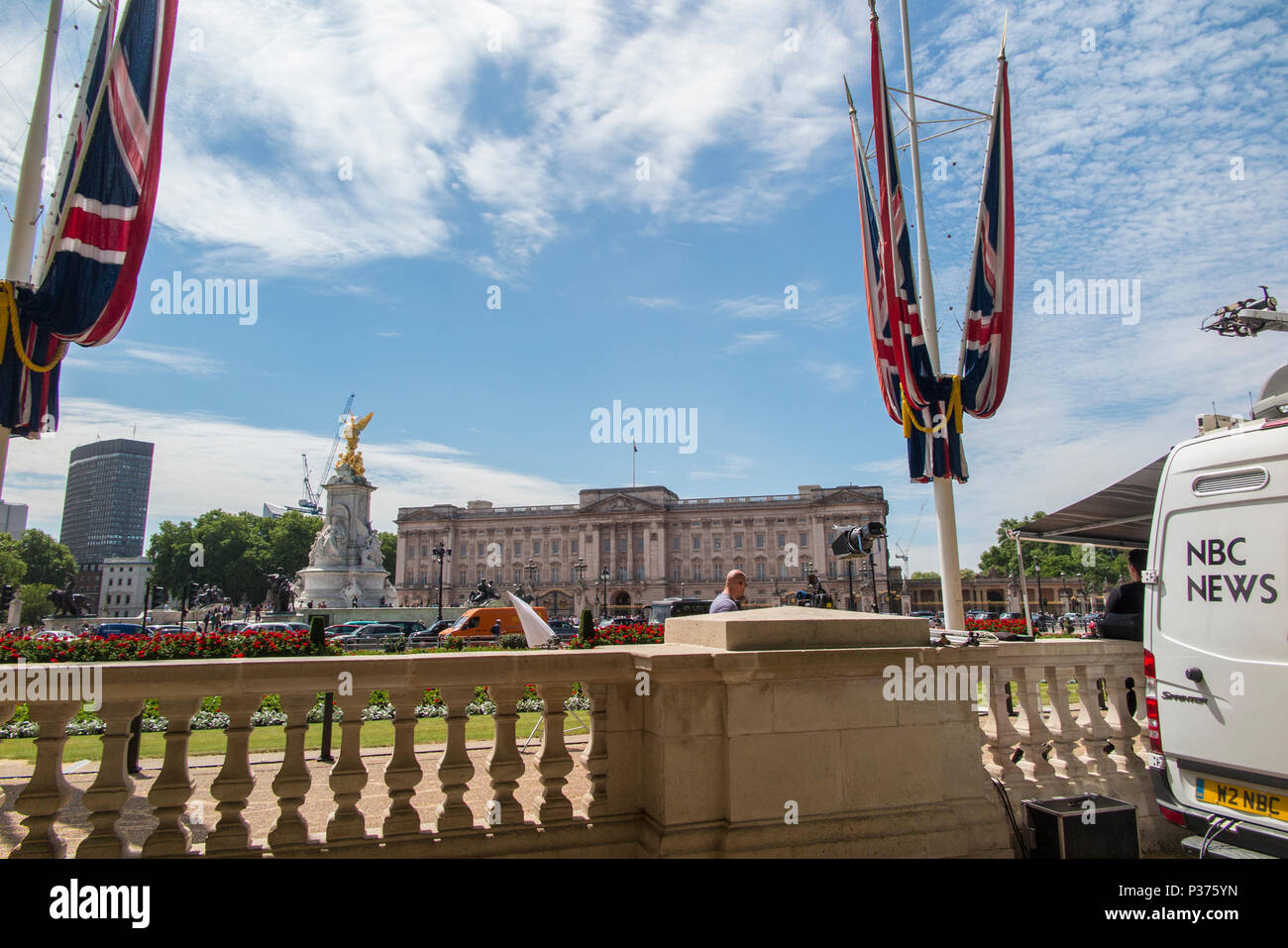 An NBC news van outside Buckingham Palace, submitting a news broadcast ...