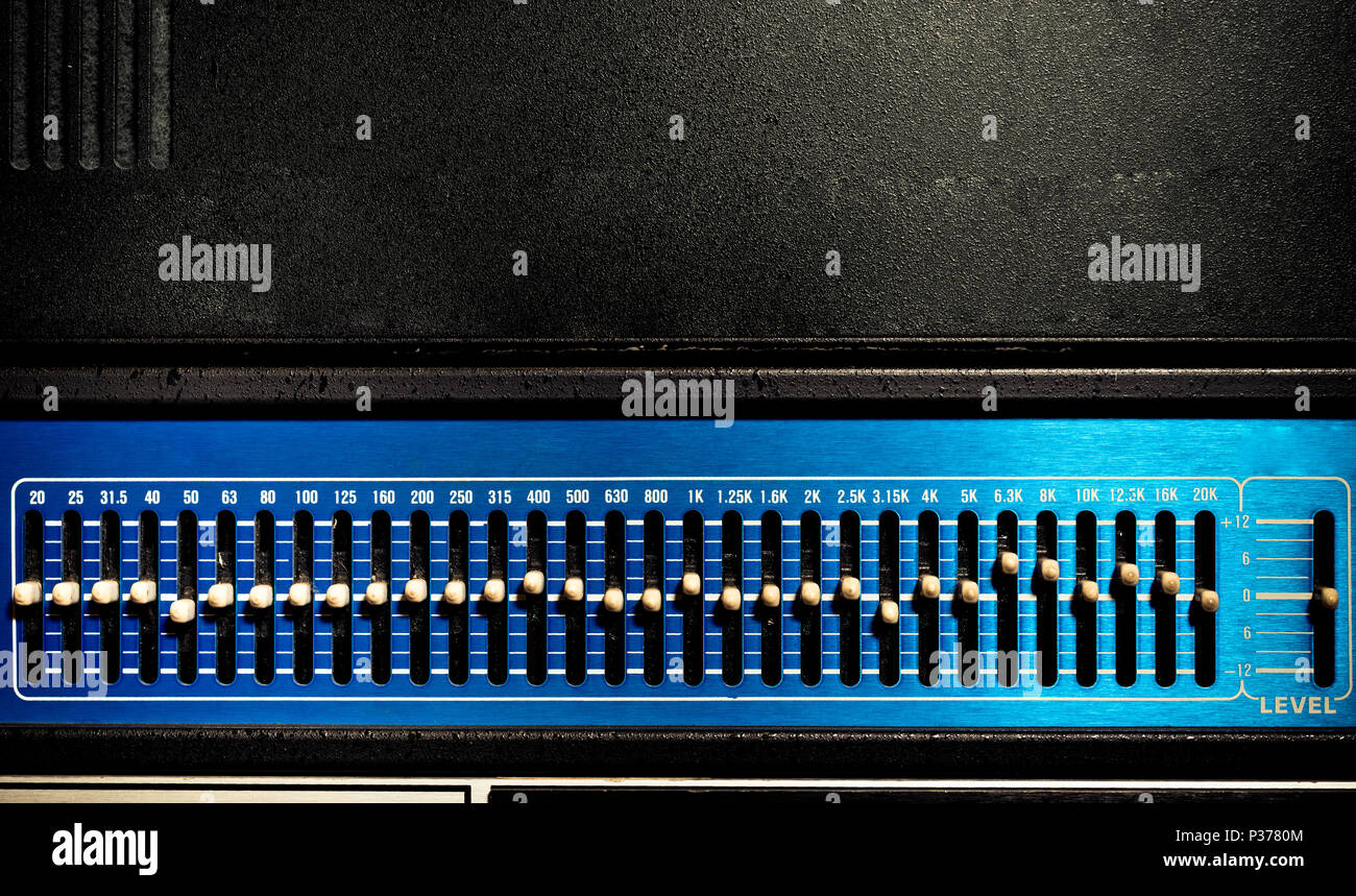 Close up of vintage sound studio audio equipment equalizer control ...