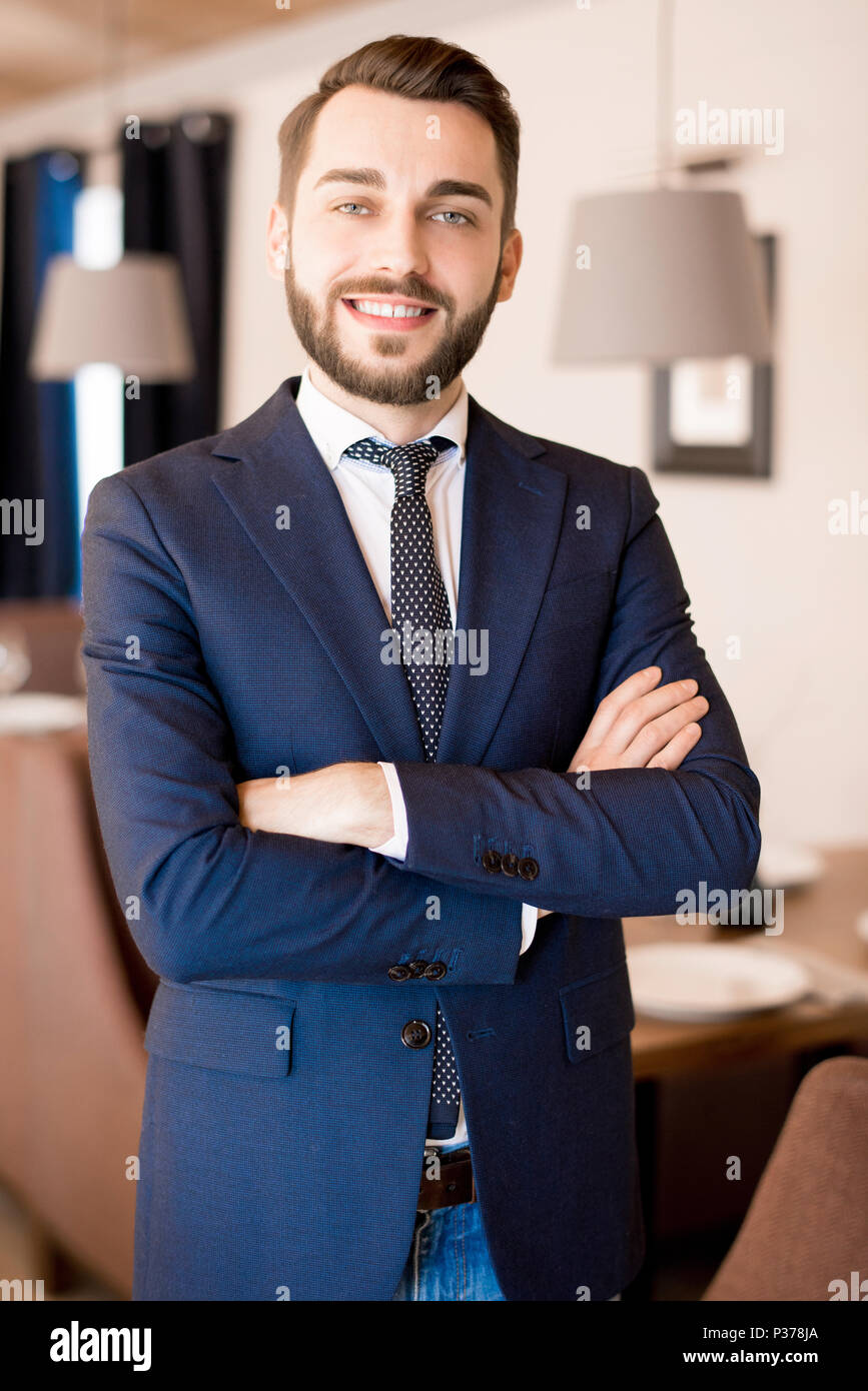 Successful restaurant owner in his establishment Stock Photo - Alamy
