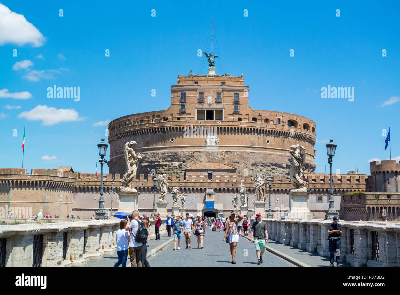 Tourists walking on Castel Sant'Angelo and ponte sant angelo bridge ...