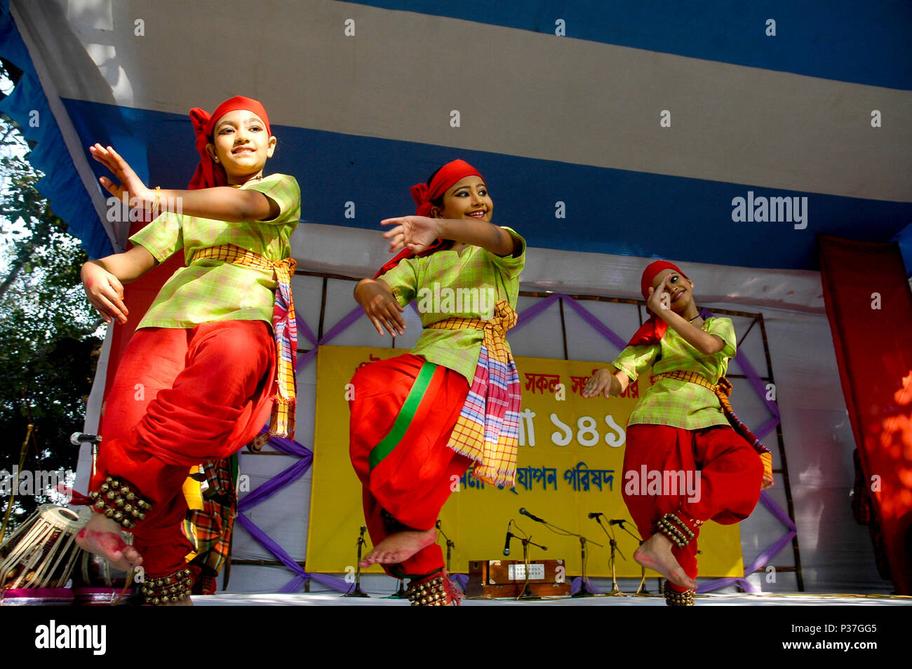 Girls perform at Poush Mela 1414 at Ramna Botomul in Dhaka, the capital ...