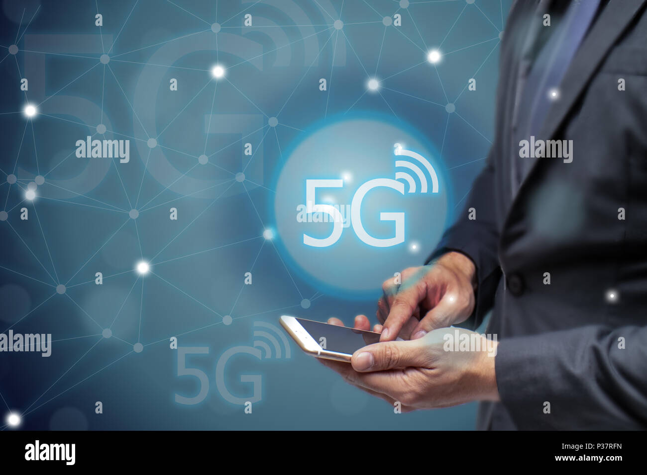 business man using mobile phone with 5g network wireless technology to ...