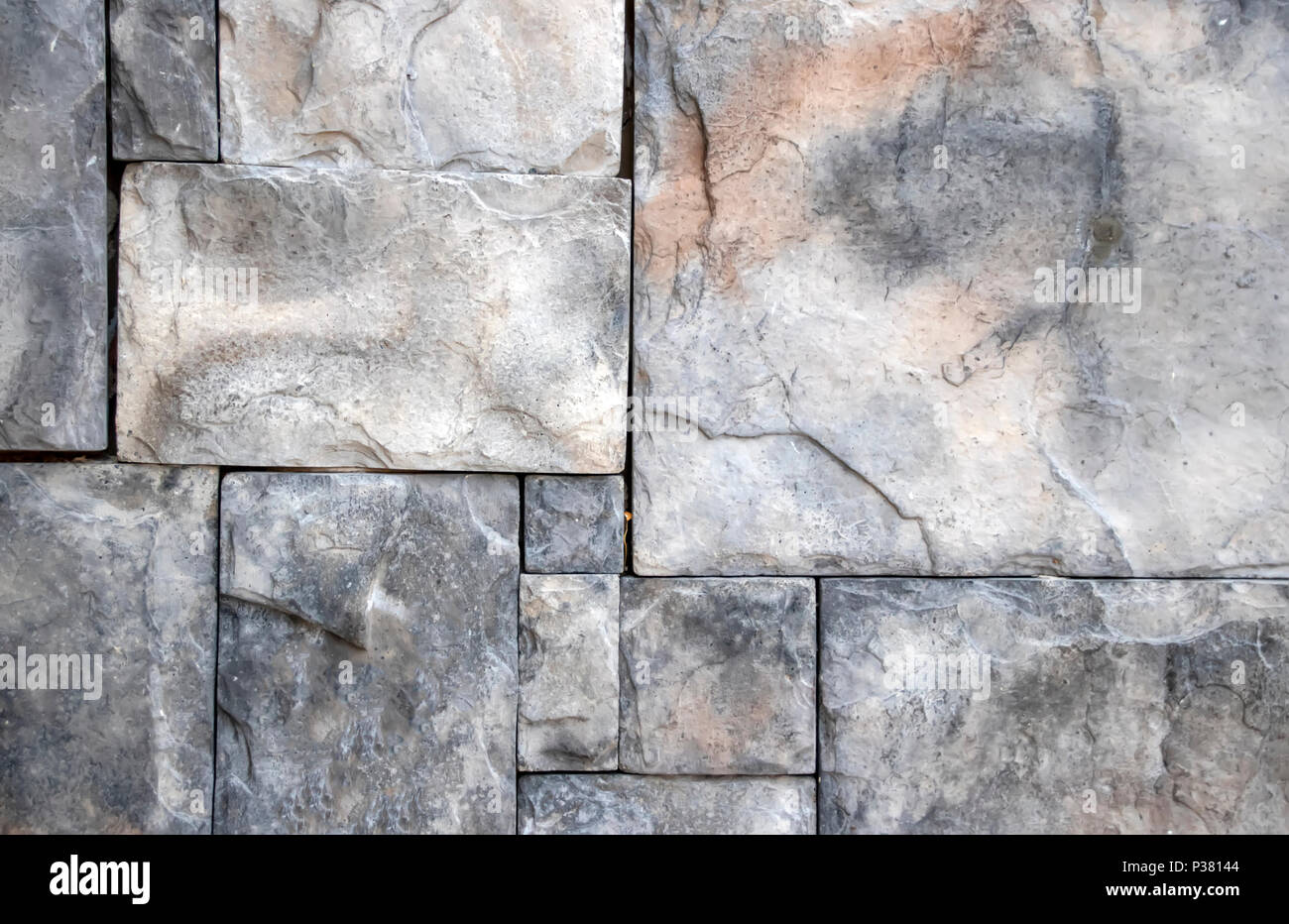 Wall masonry of large natural stones of different sizes Stock Photo - Alamy