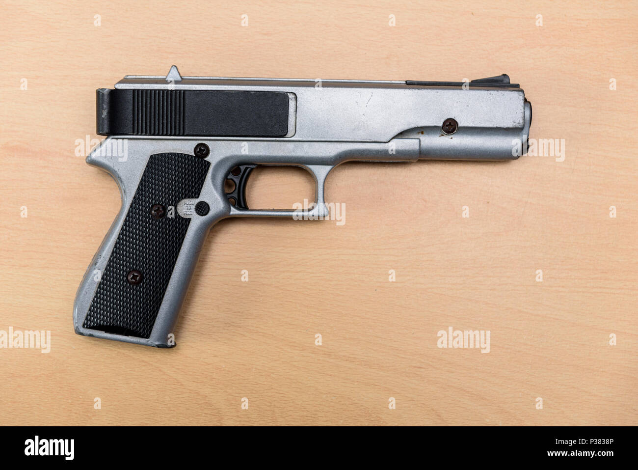 Silver hand gun hi-res stock photography and images - Alamy