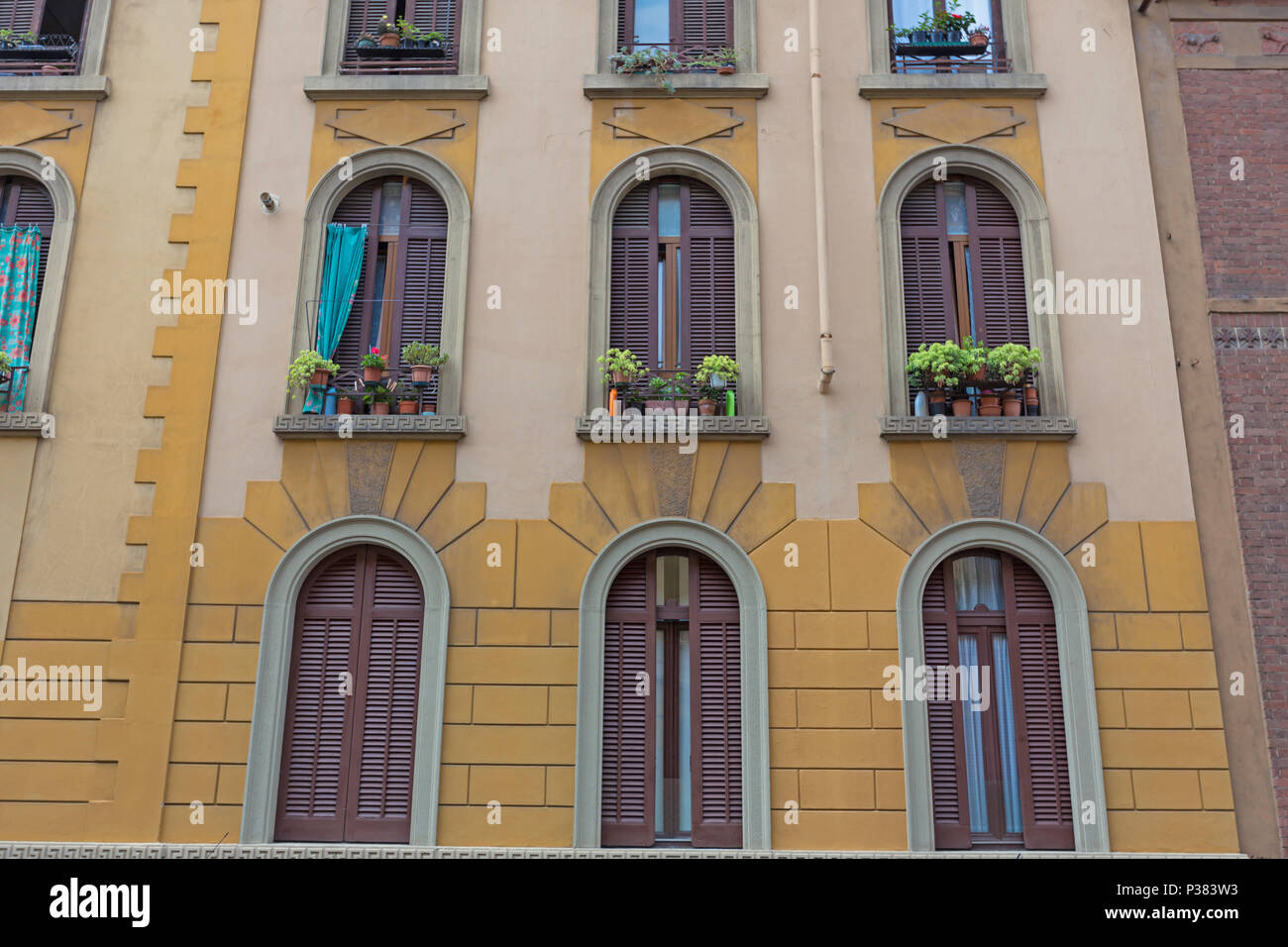 Windows of an apartment in Milan Italy Stock Photo - Alamy