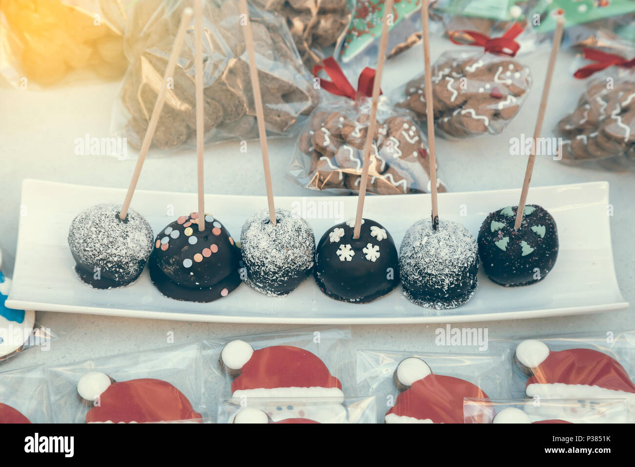 New Year chocolate covered and decorated marshmallows. Vintage style ...