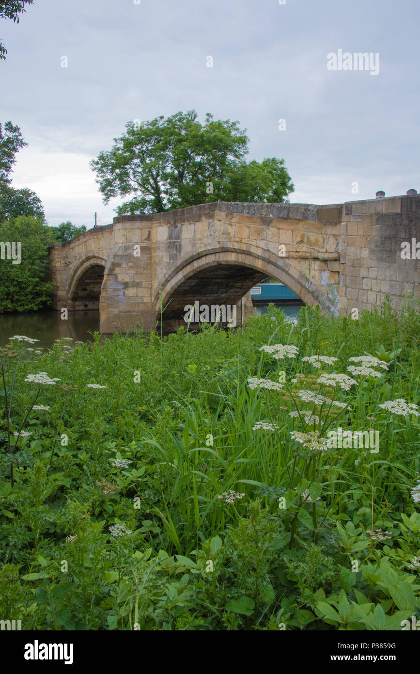 The old stone bridge over the river Derwent between Elvington and ...