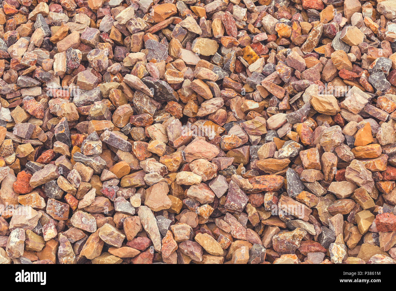 Crushed red granite stone, gravel background. Decomposed granite ...