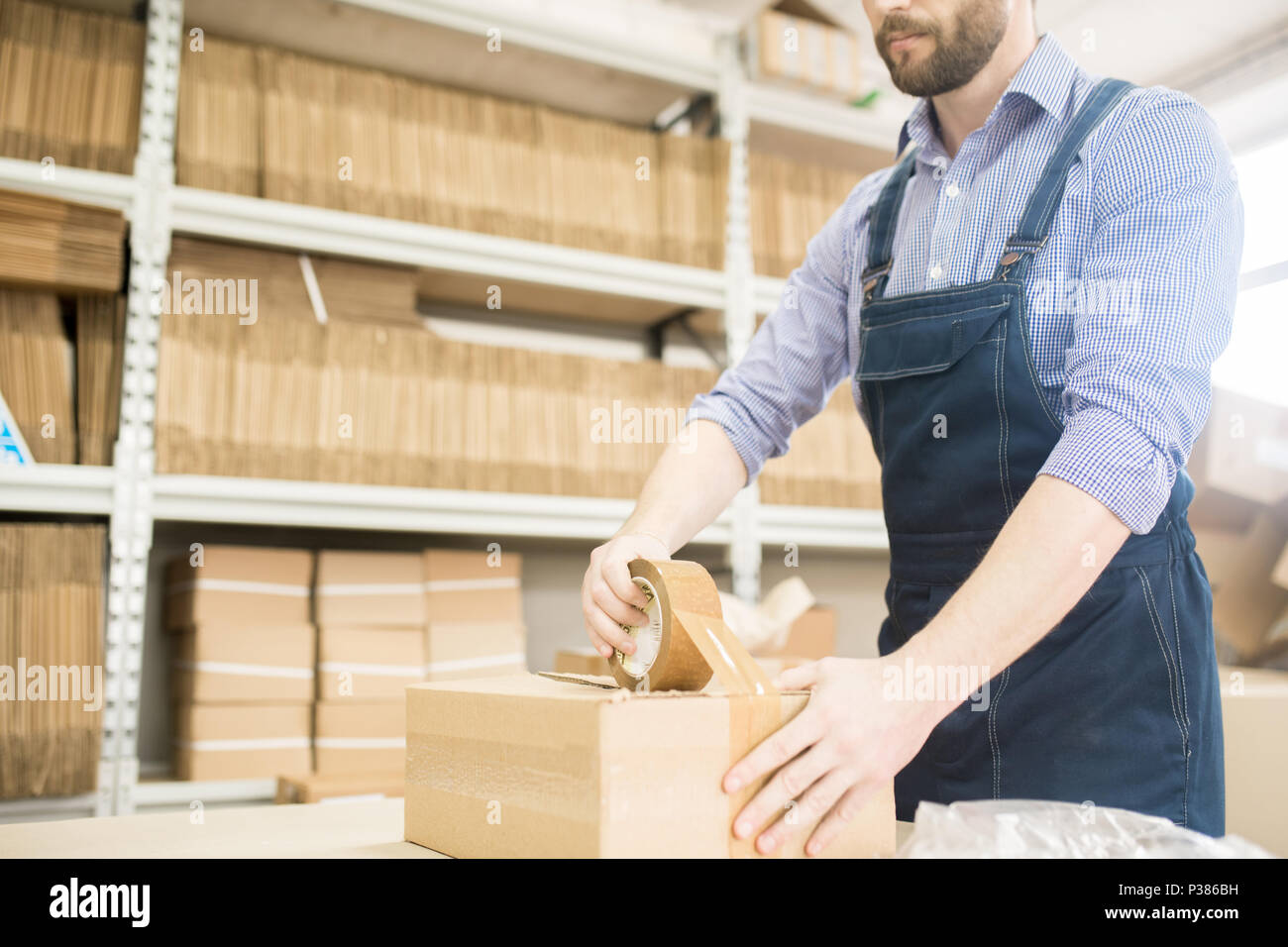 Packing Production Unit in Cardboard Box Stock Photo - Alamy