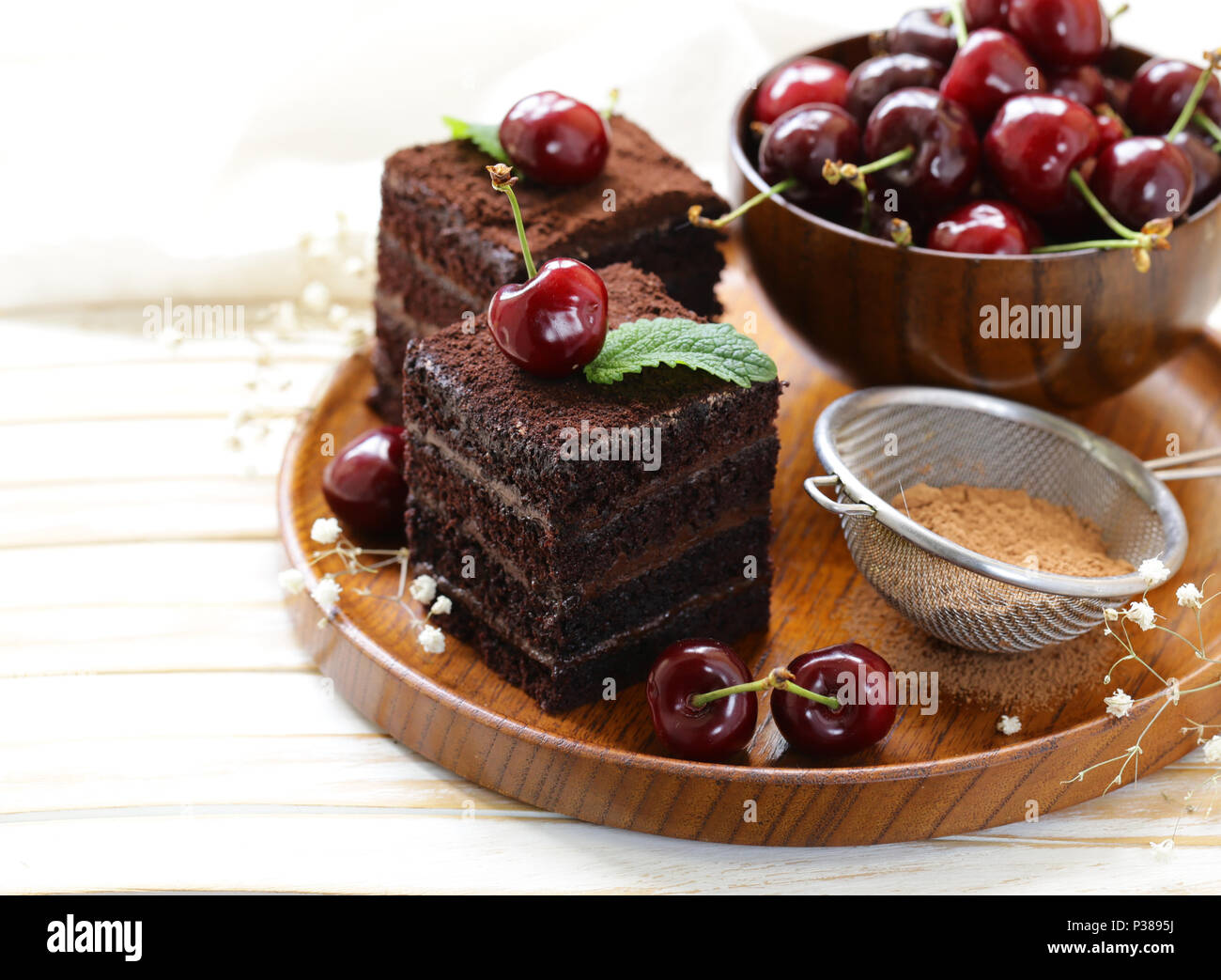 super chocolate truffle cake with fresh berries Stock Photo - Alamy