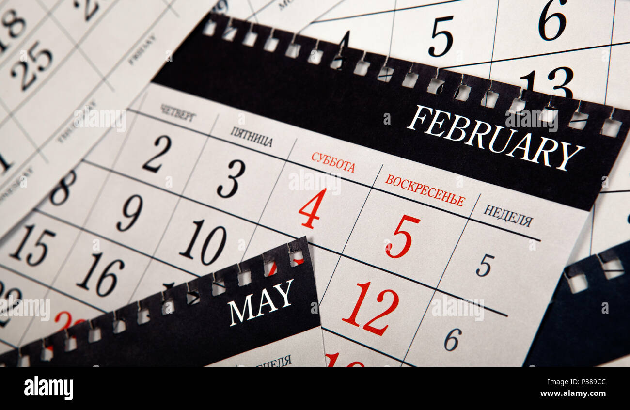 pile of wall calendar sheets on the table close up Stock Photo - Alamy