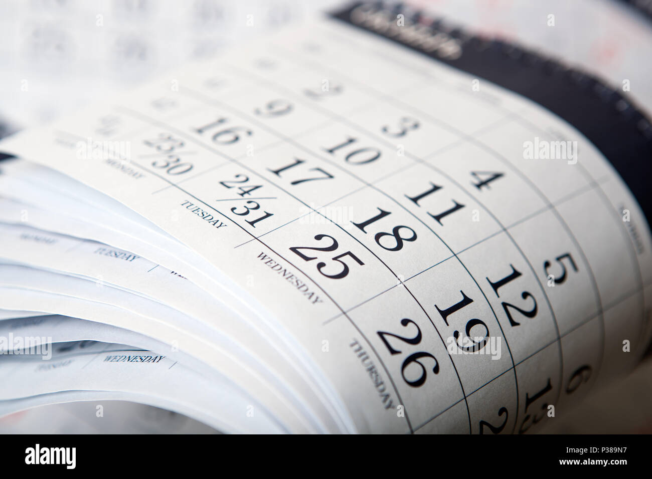 pile of wall calendar sheets close up Stock Photo - Alamy