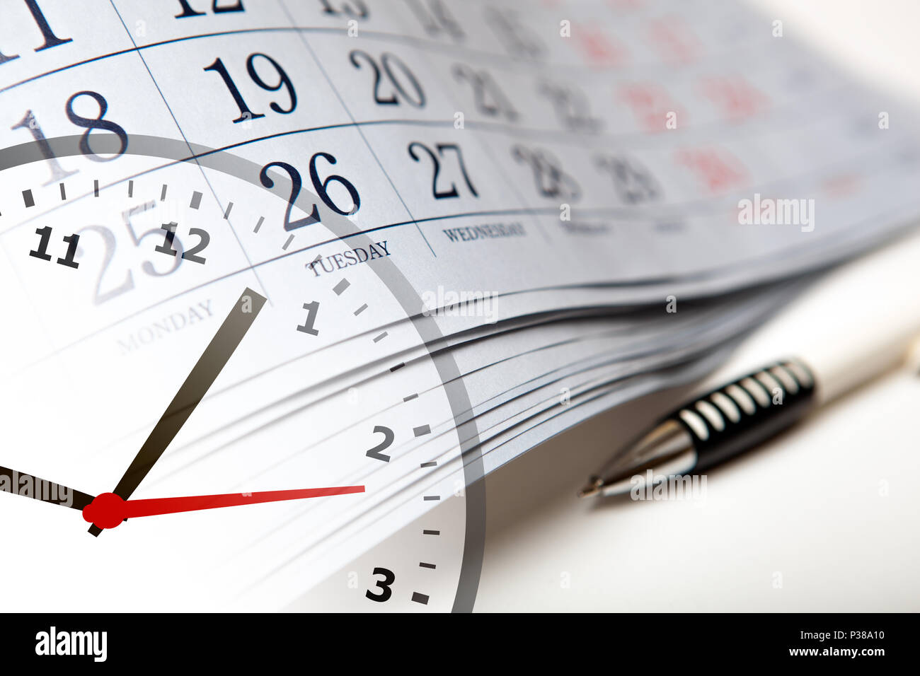 wall calendar calendar with the number of days and clock close up Stock ...