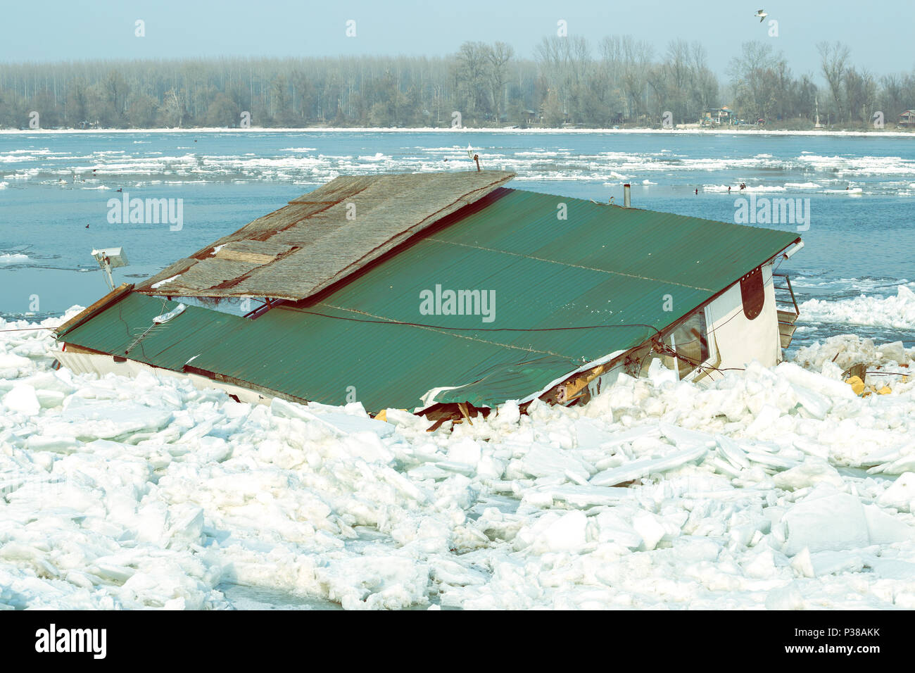Raft house in ice after being hit by pack ice. Vintage style Stock ...