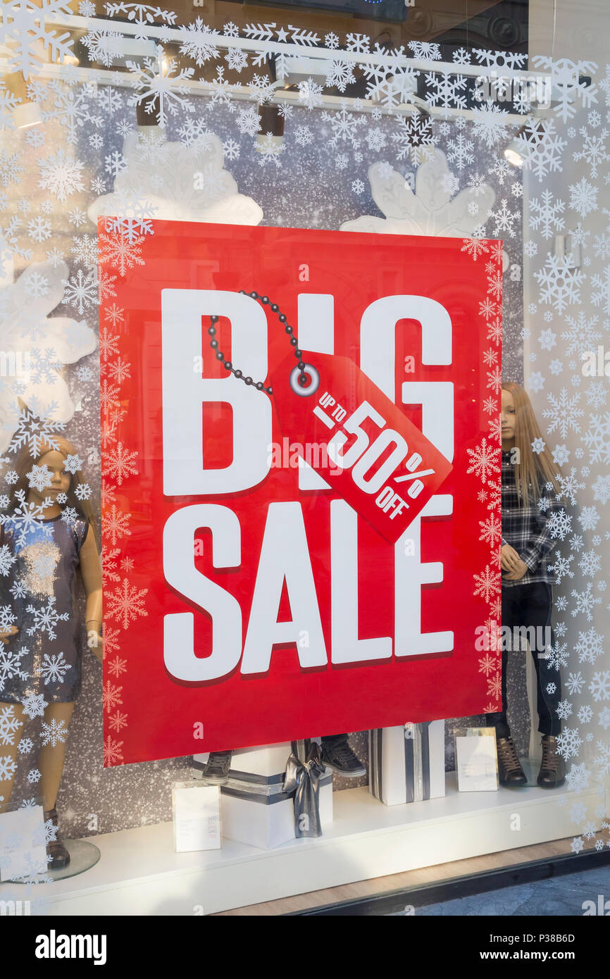 Sale sign in shop window, discount sale sign, sign 50 percent off the ...