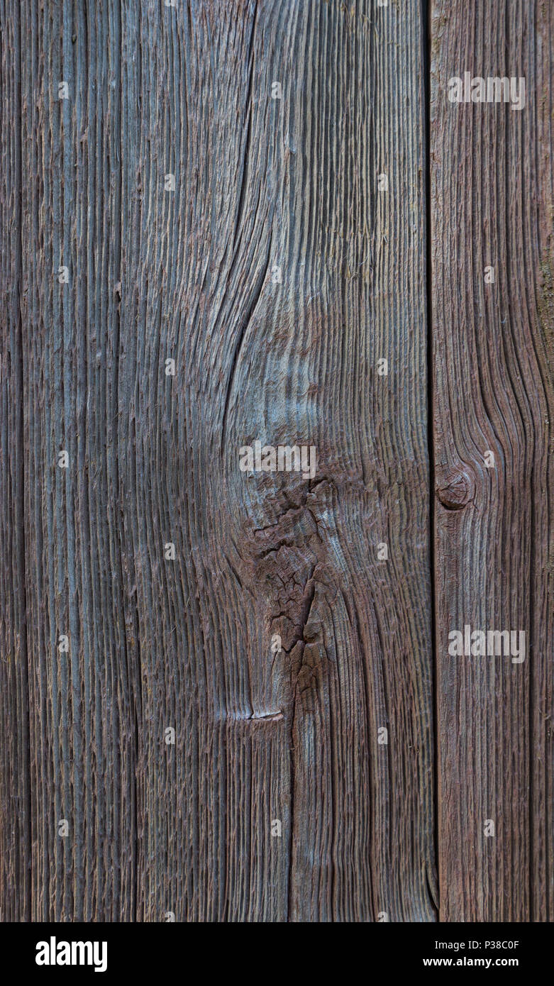 Close-up of an old and unpainted rustic wood board texture background ...