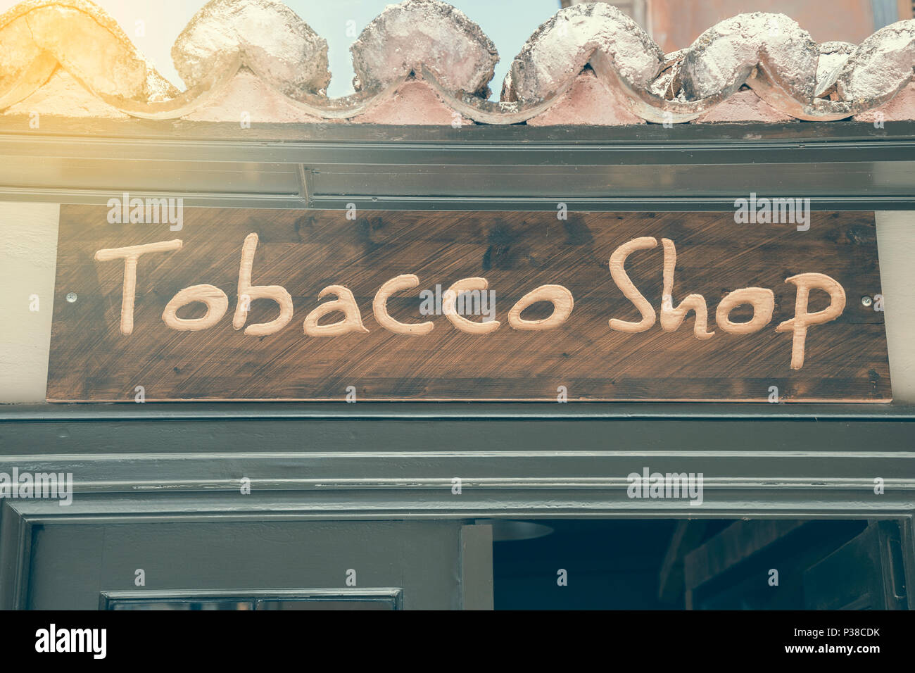 Tobacco Shop, wooden sign at the entrance in tobacco shop. Vintage ...