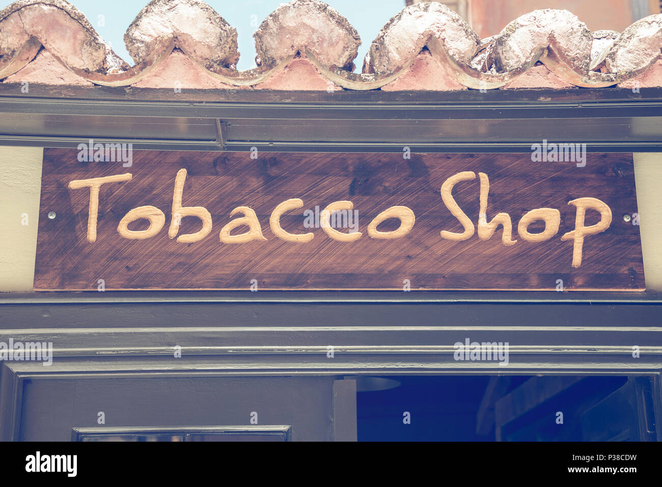 Tobacco Shop, wooden sign at the entrance in tobacco shop. Vintage ...
