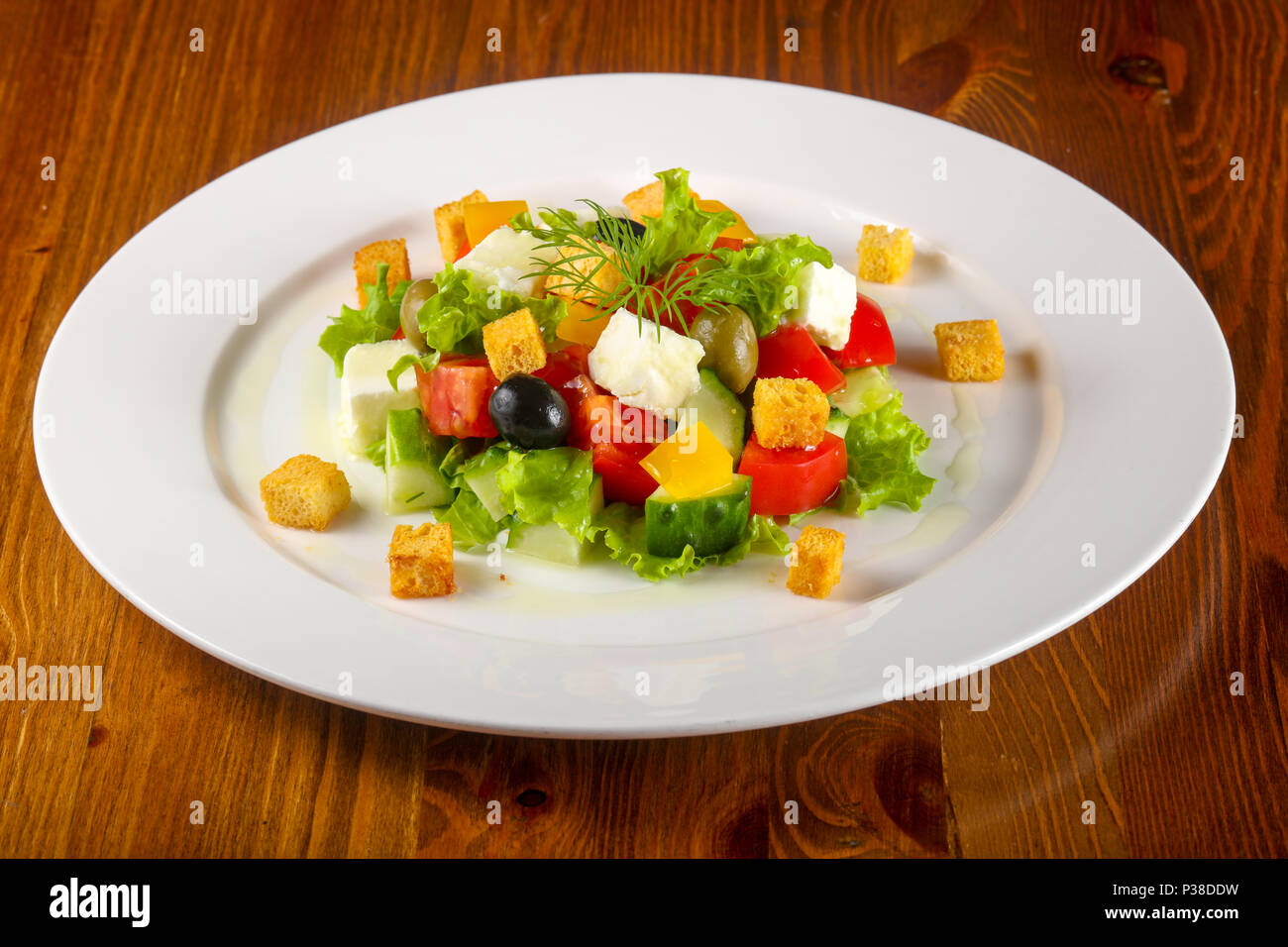 Greek salad with cracker Stock Photo - Alamy
