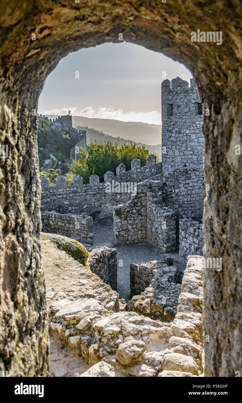 Castle wall across the mountain, entrance frame Stock Photo - Alamy
