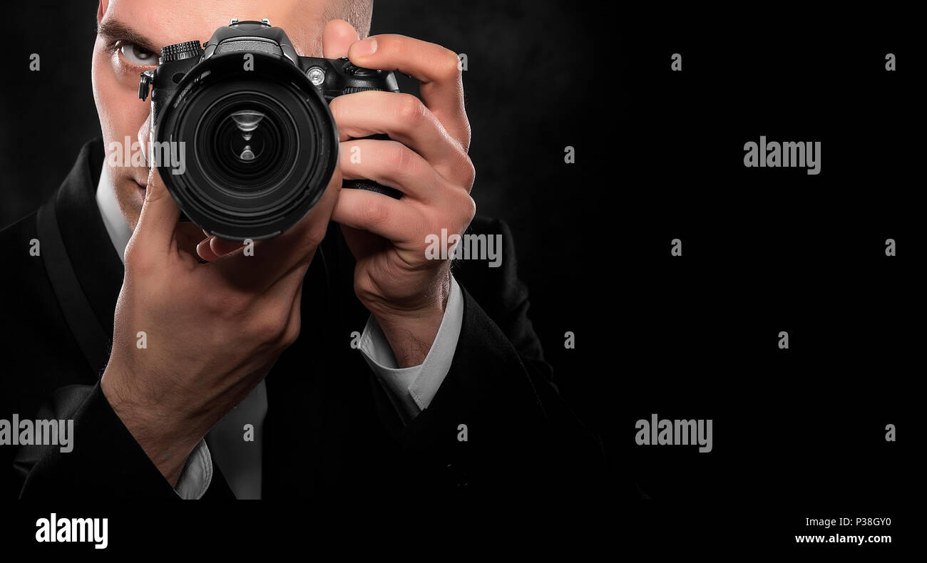 Photographer with camera Stock Photo - Alamy