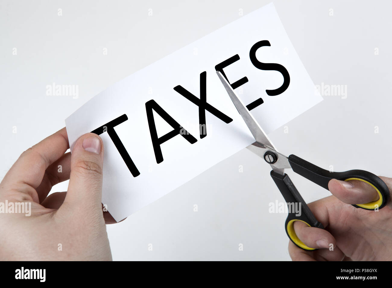 Scissors cut taxes hi-res stock photography and images - Alamy