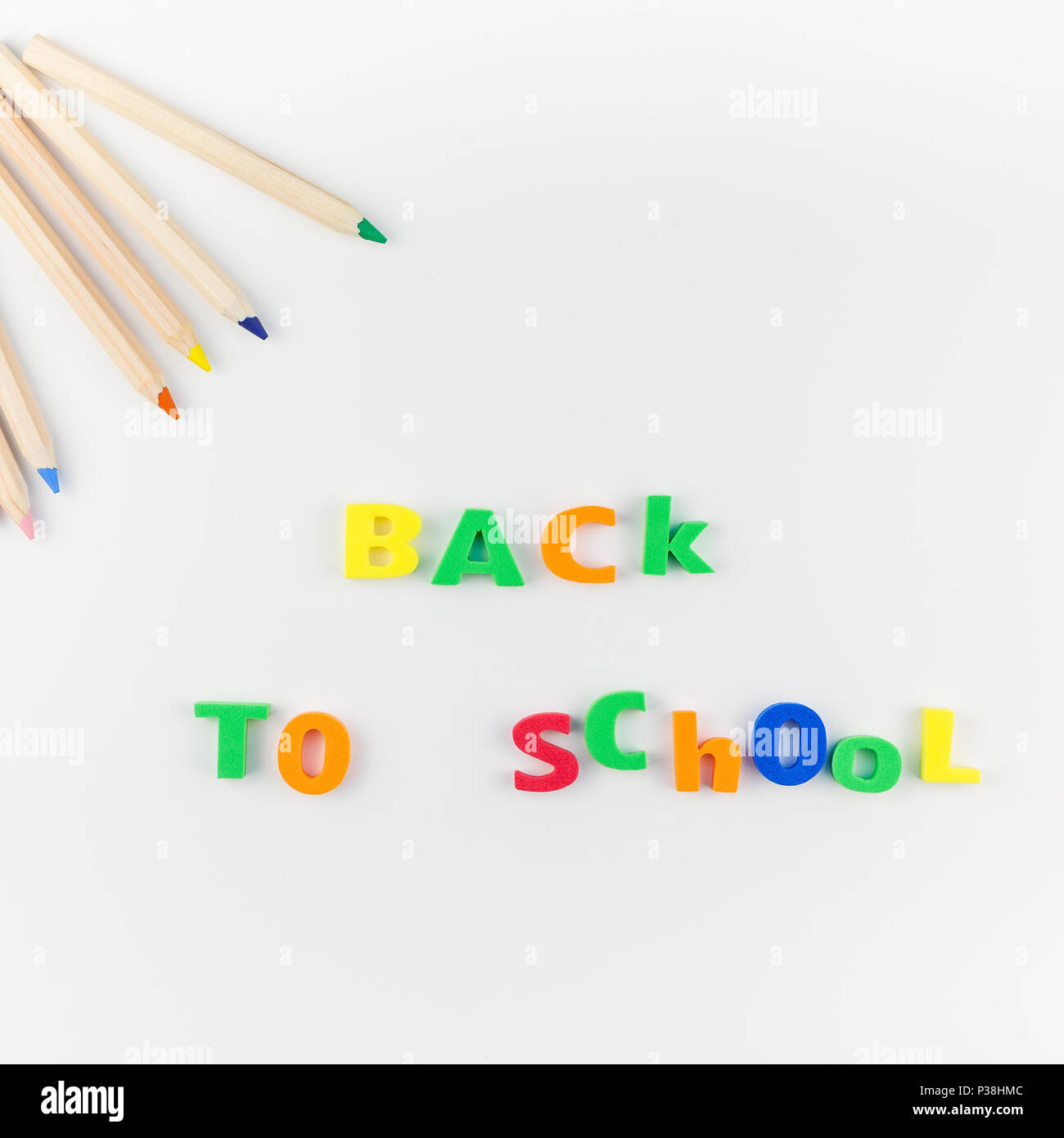 Square flat lay back to school concept with color school and office ...