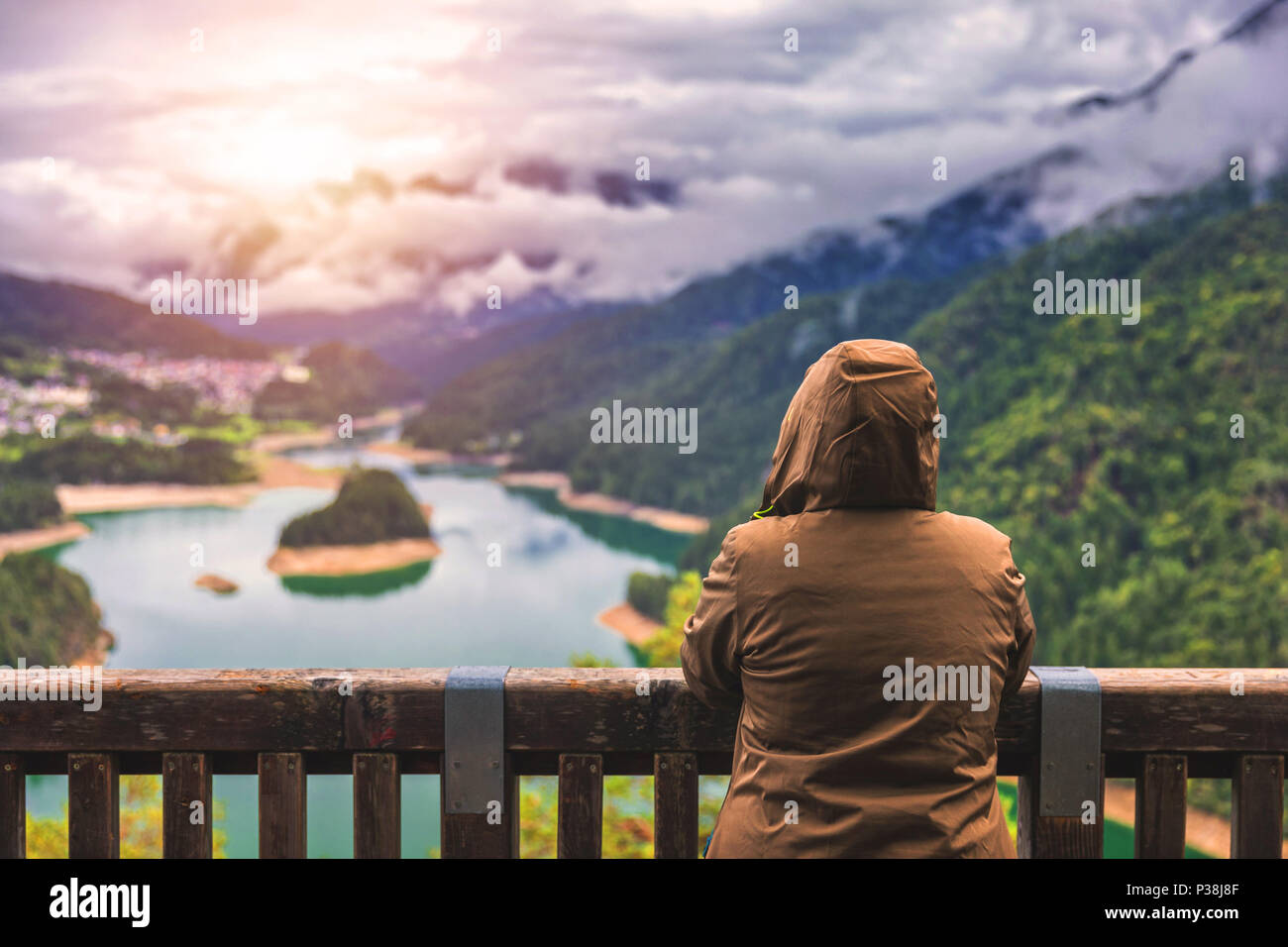 Traveler enjoying the panoramic view of lake of Centro Cadore in the ...