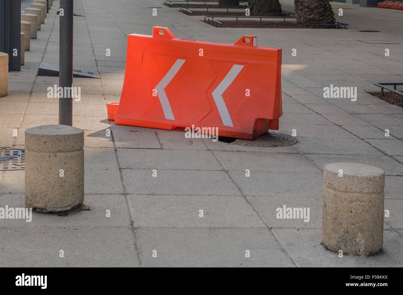 Broken culvert covered with an orange plastic structure used in ...