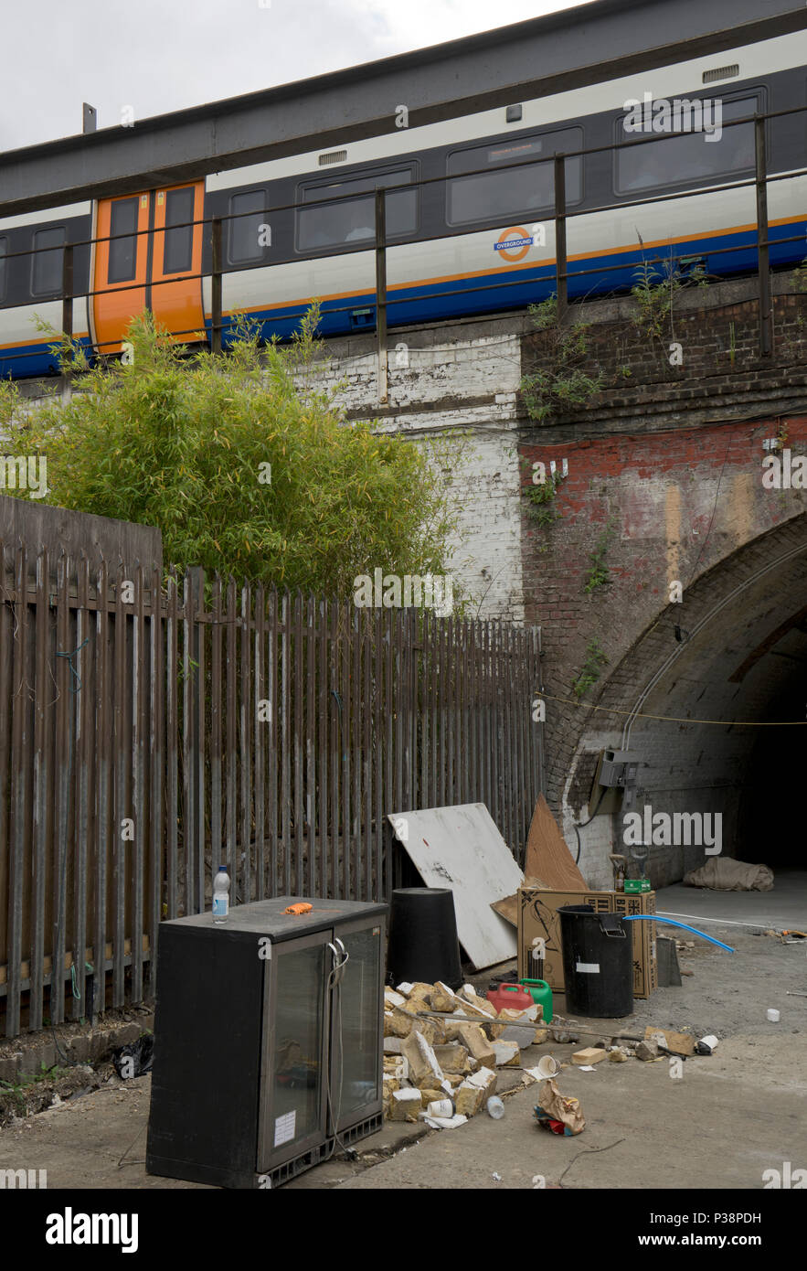 Small business under railway arches by train and overground station, to ...