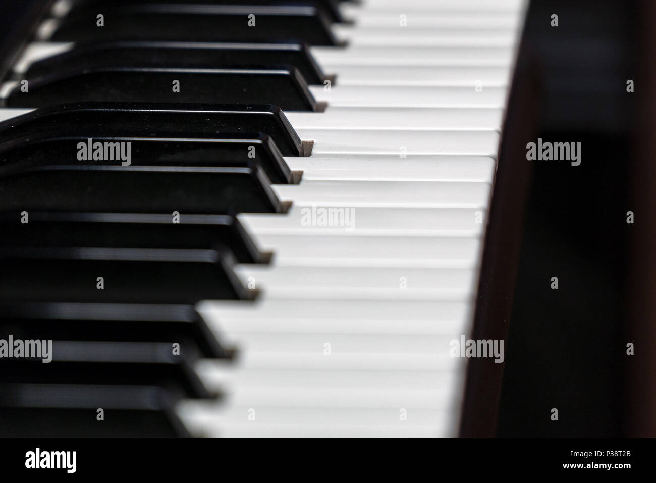View of the piano keyboard on the side Stock Photo - Alamy