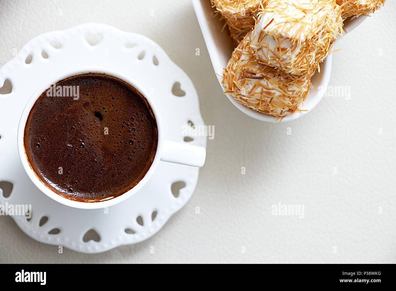 Turkish coffee with Shredded dough baked in syrup topped with crushed ...