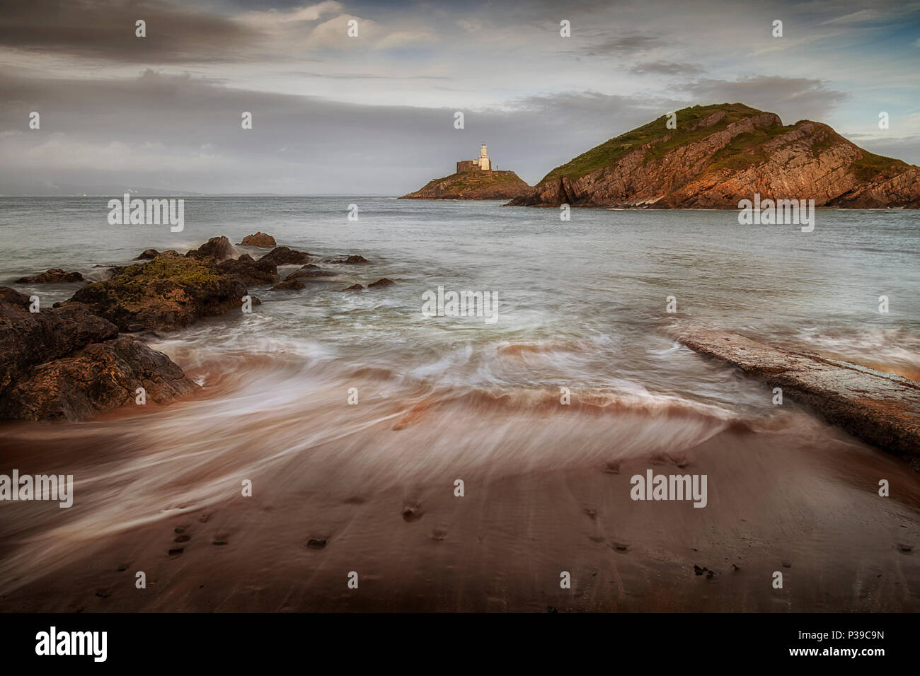 Mumbles Lighthouse and beach Stock Photo - Alamy