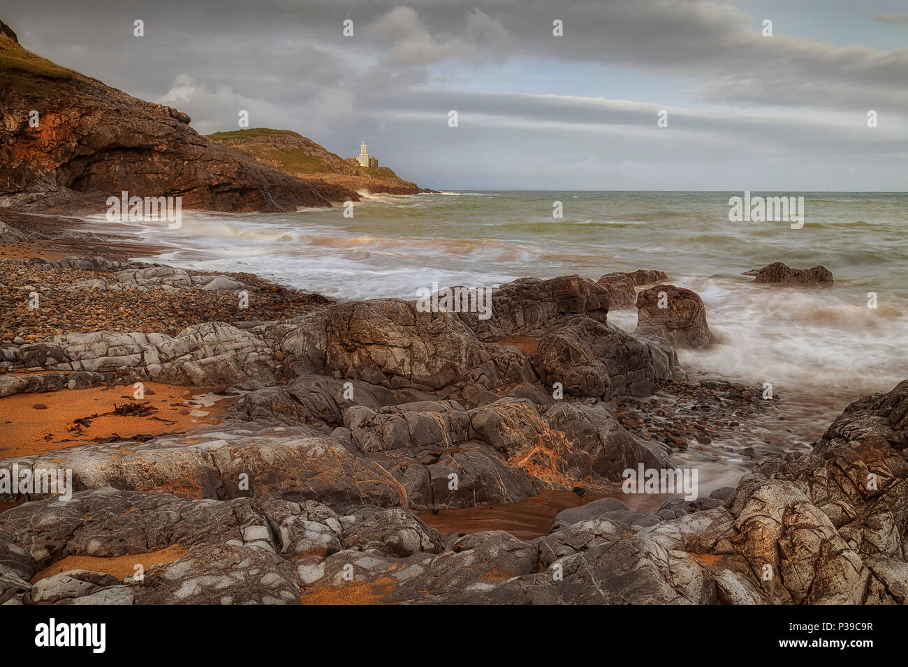 Bracelet Bay and Mumbles lighthouse Stock Photo - Alamy