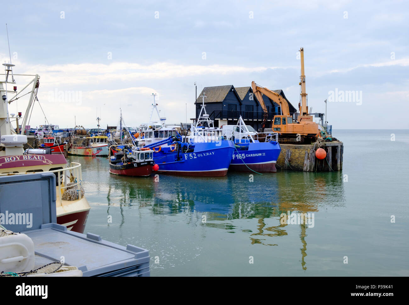 Fishing boats in Whitstable harbour, Kent, UK Stock Photo - Alamy