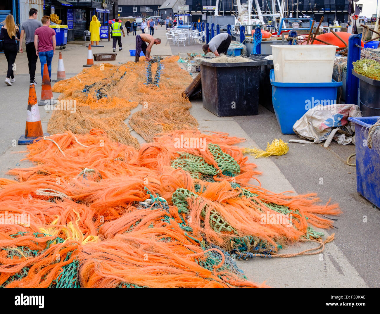 Laying out fishing nets and equipment on the quayside at Whitstable ...