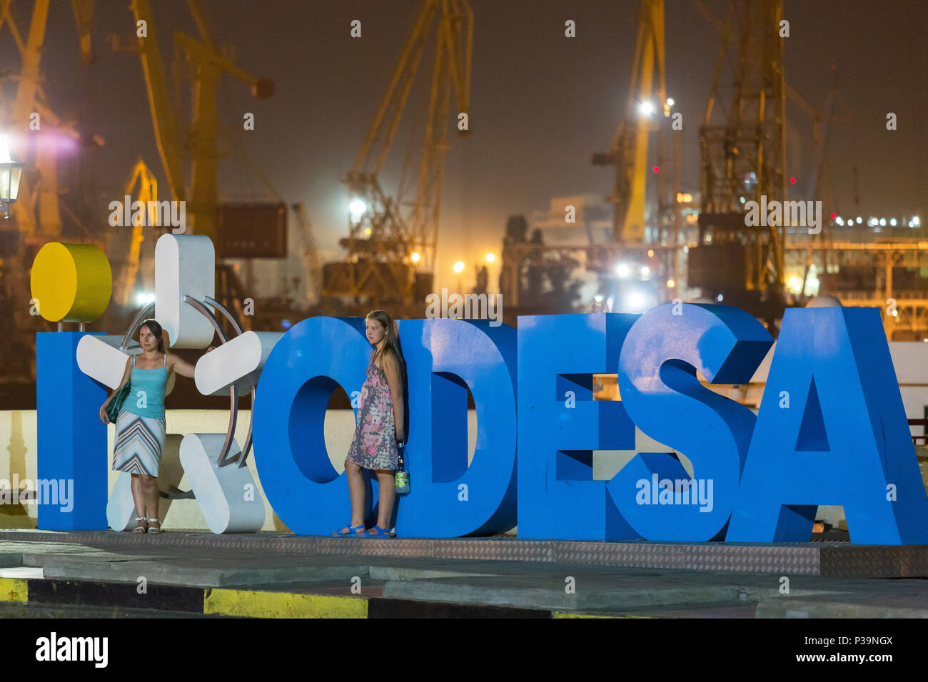 Odessa, Ukraine, visitors take souvenir photos at Odesa lettering at ...