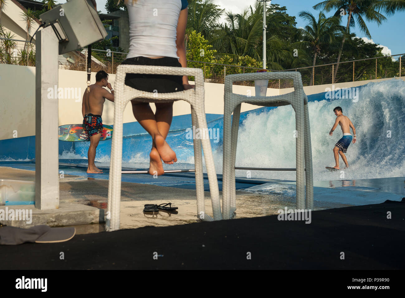 Singapore, Republic of Singapore, surfing at Wave House on Sentosa ...