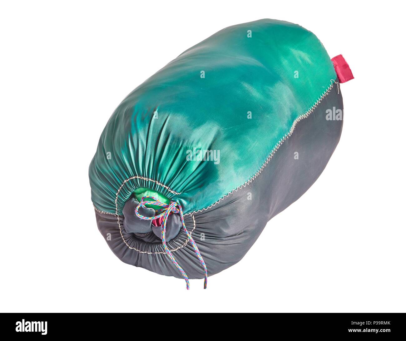 Sleeping bag packed Stock Photo - Alamy