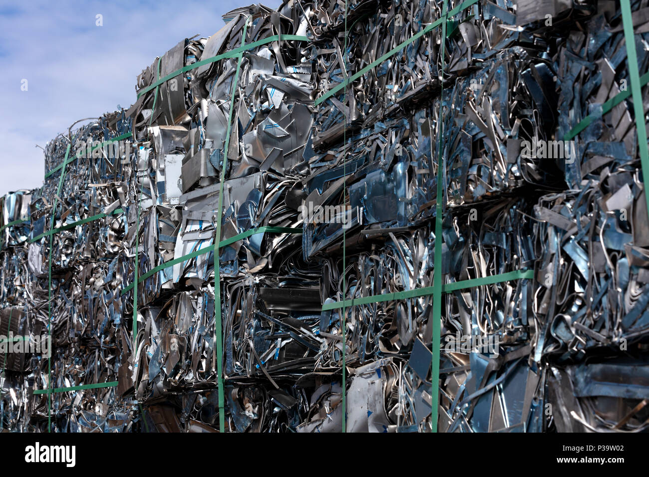 aluminum scrap and profiles pressed into cubes for remelting in a ...