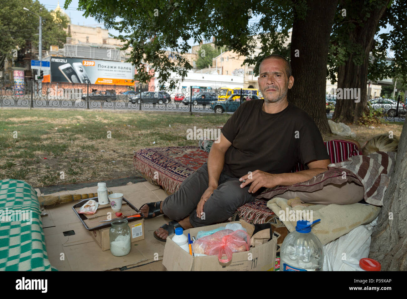 Odessa, Ukraine, homeless couple in the middle of a roundabout Stock ...