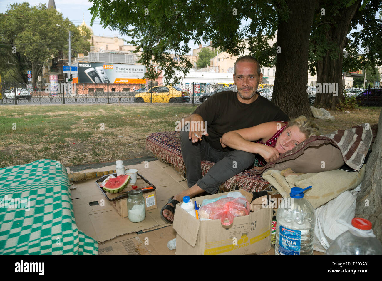 Odessa, Ukraine, homeless couple in the middle of a roundabout Stock ...