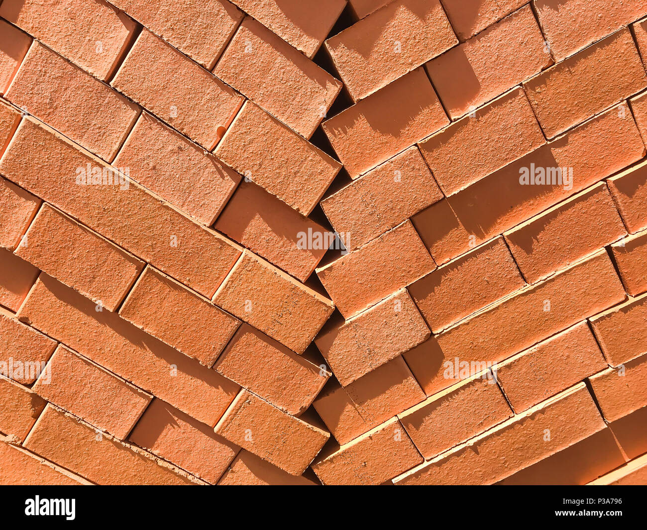 Theme of construction. Brick background. Studio Photo Stock Photo - Alamy