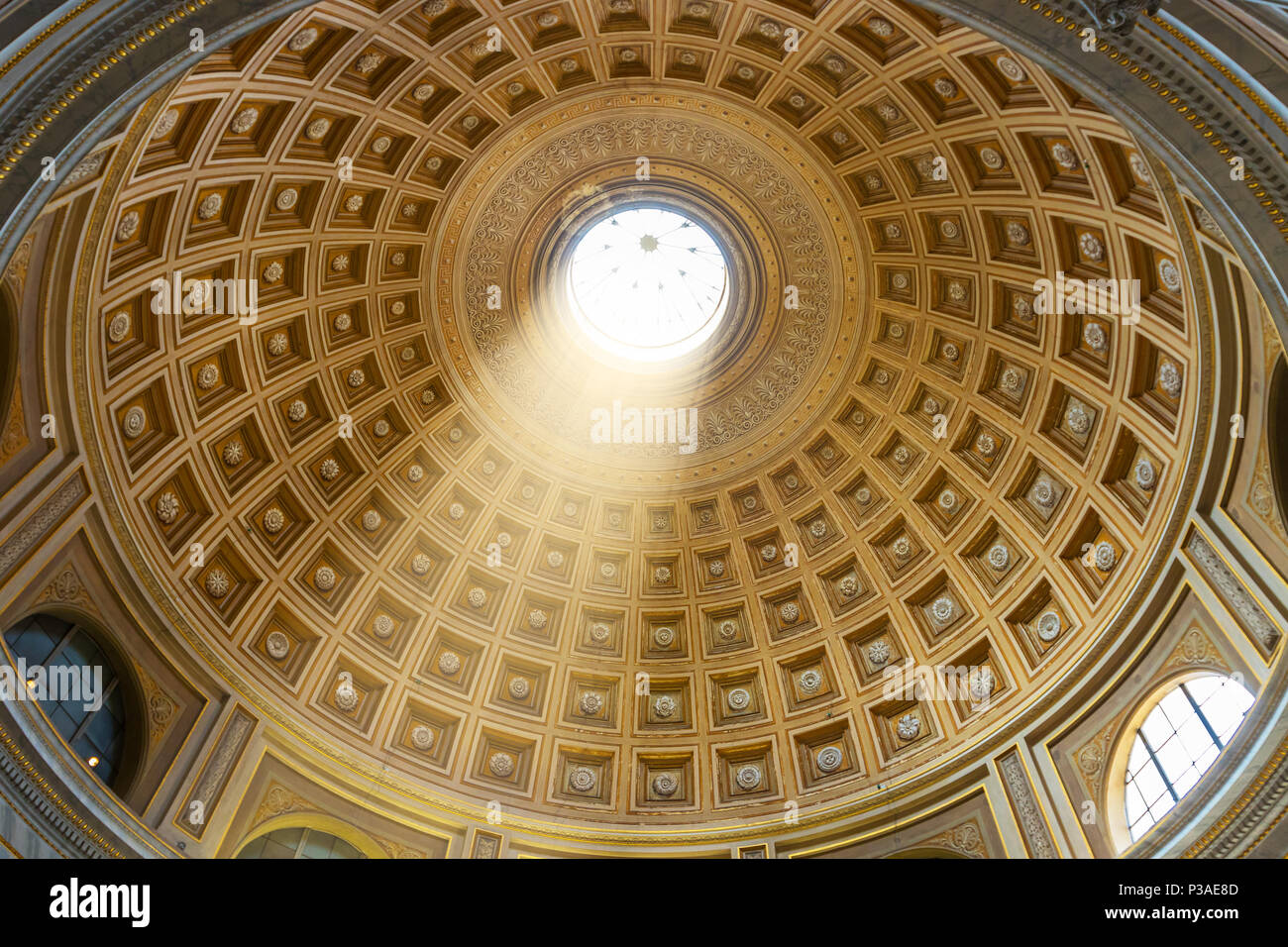 beam of light in the dome of the basilica in Vatican, museum halls in ...