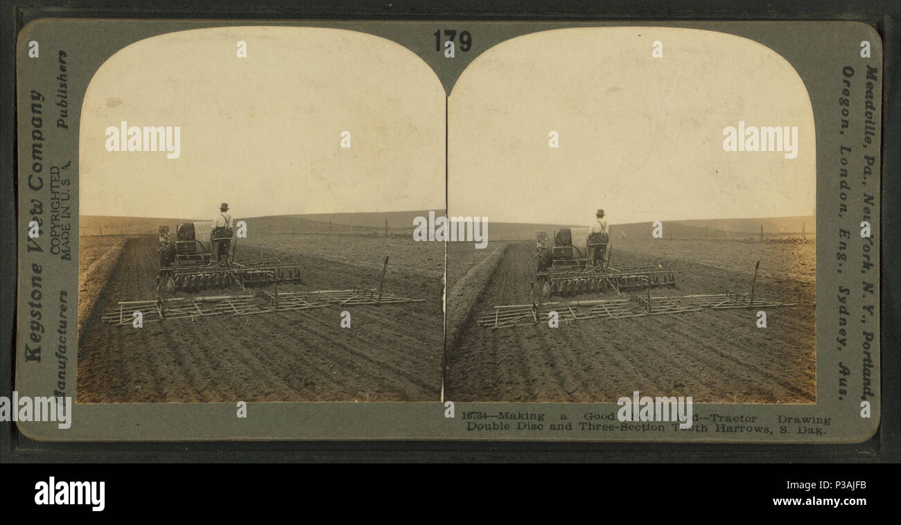 . Making a good seed bed - tractor drawing double disc and three ...