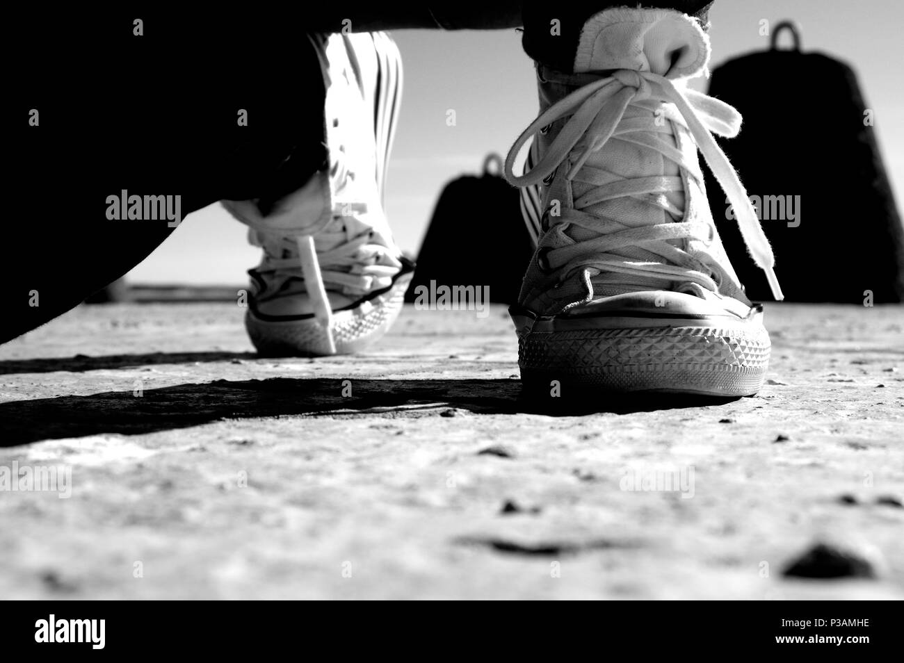 Old white sneaker chucks shoes Stock Photo - Alamy