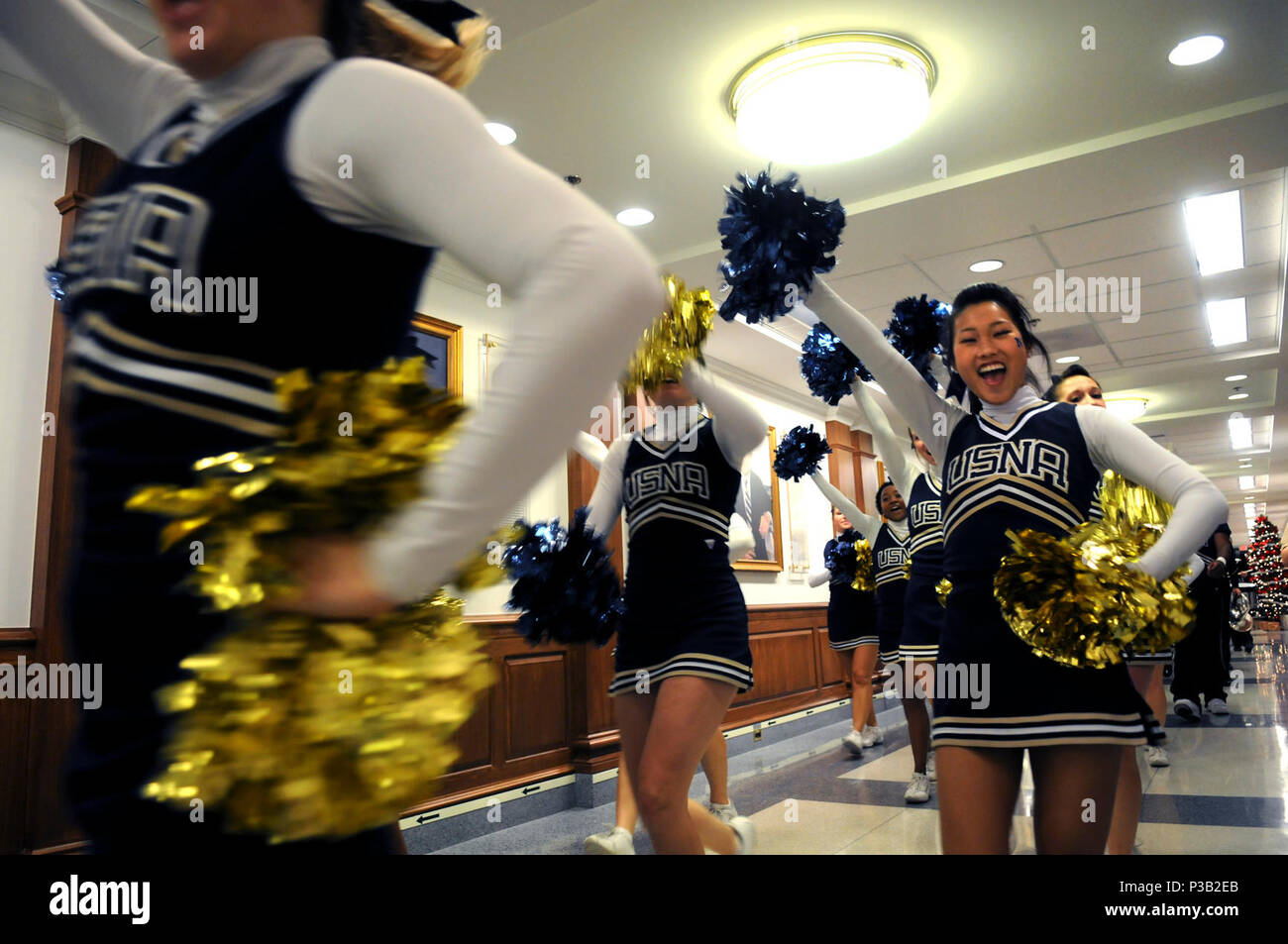 (Dec. 4, 2008) U.S Naval Academy cheerleaders and members of the ...