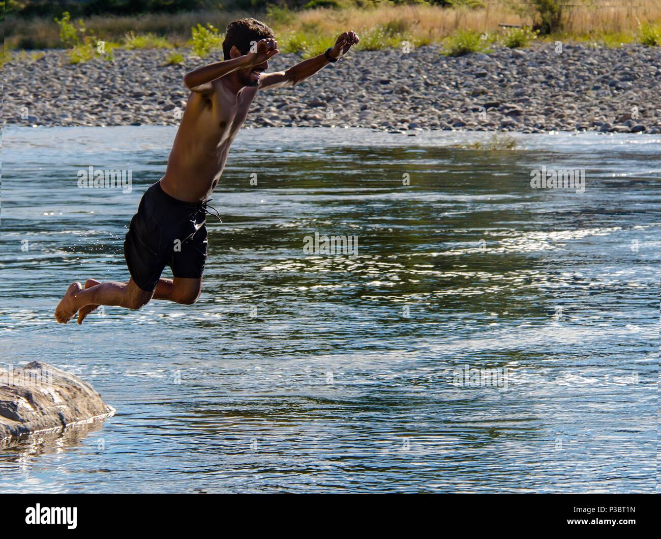 Indian man jumping hi-res stock photography and images - Alamy
